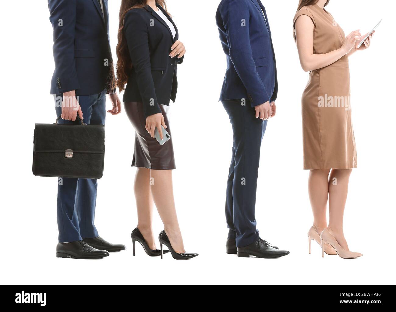 Young business people waiting in line on white background Stock Photo ...