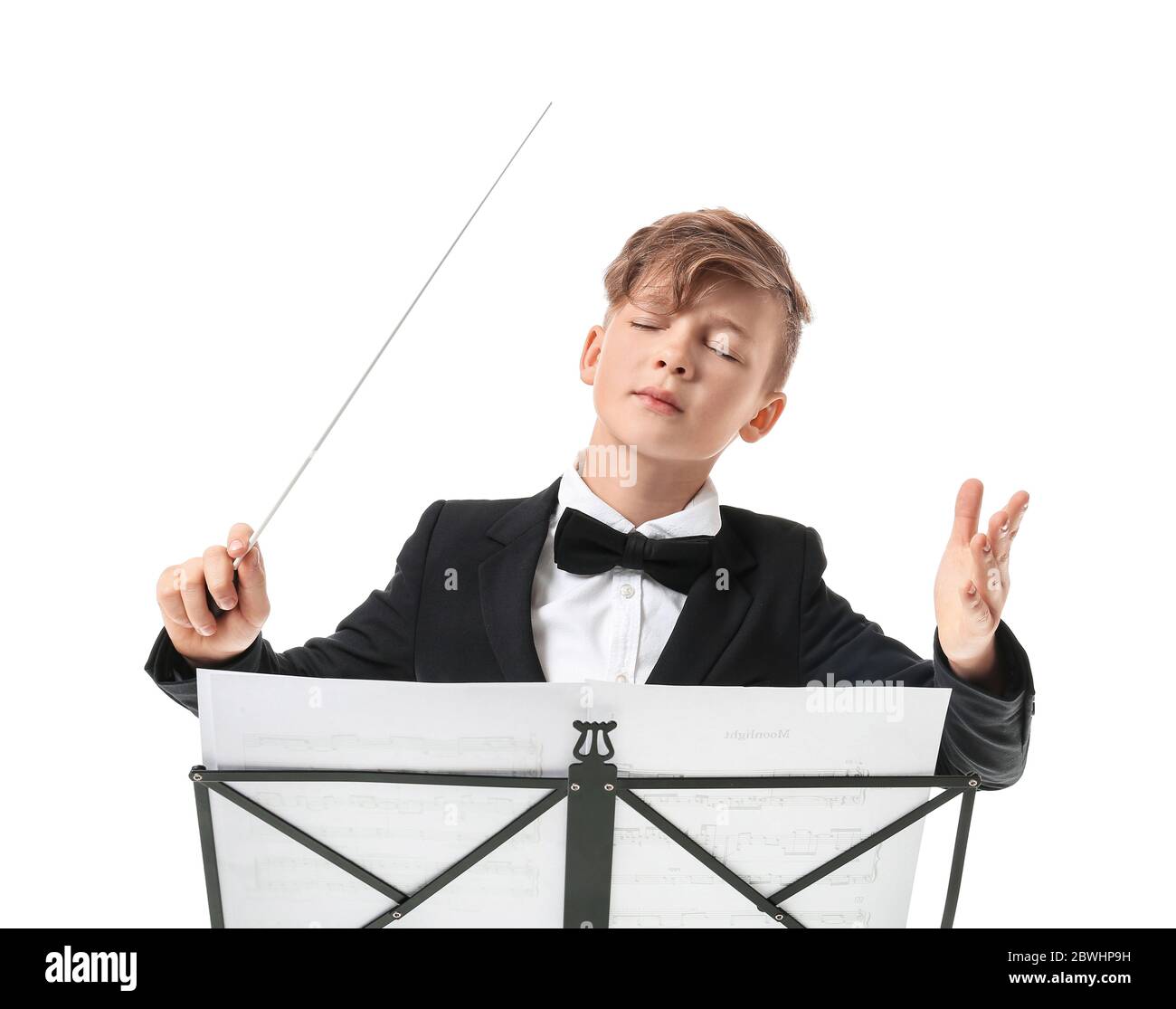 Little conductor on white background Stock Photo - Alamy