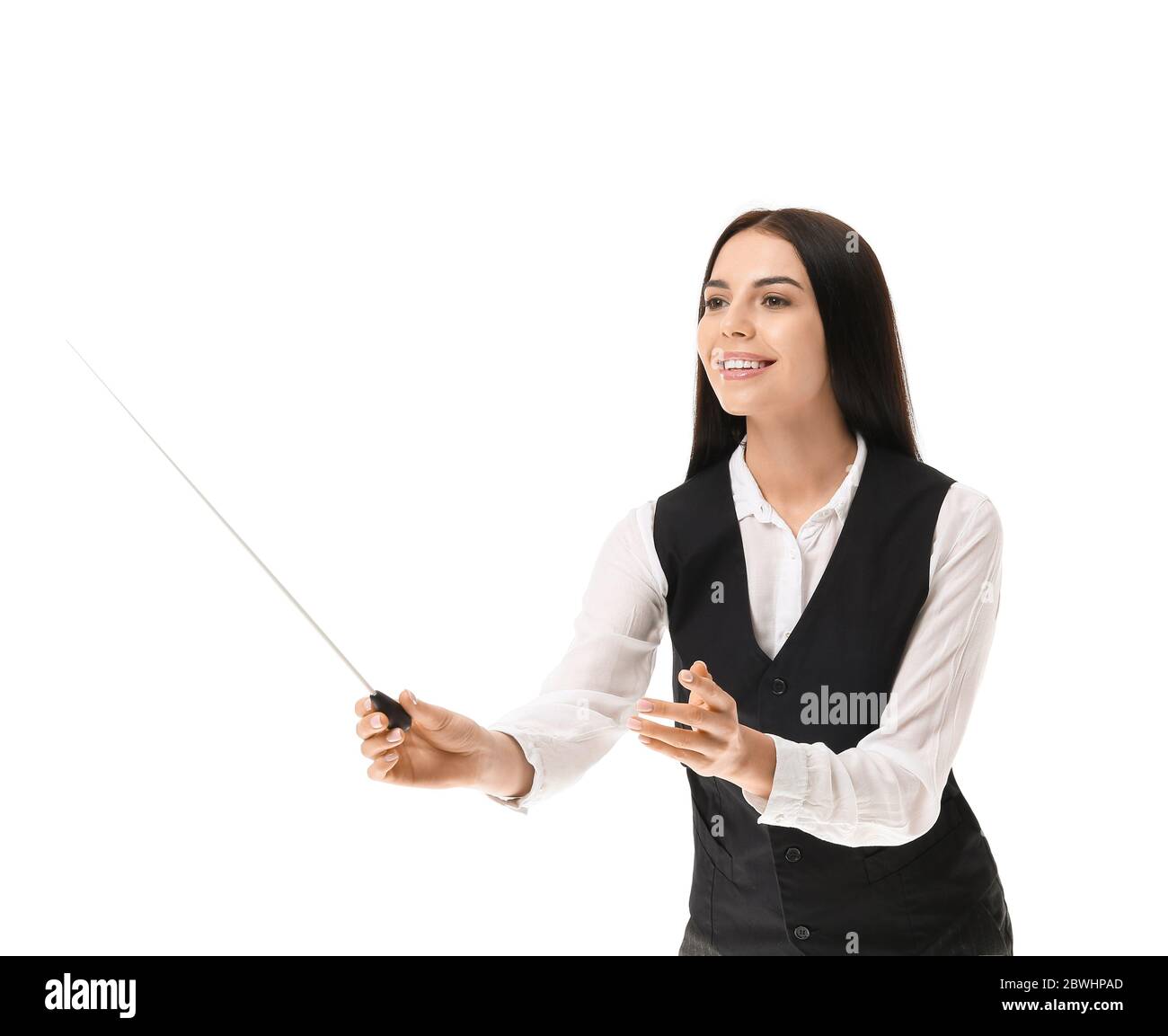 Young female conductor on white background Stock Photo - Alamy