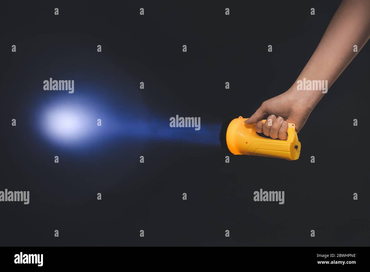 Hand holding glowing flashlight hi-res stock photography and images - Alamy