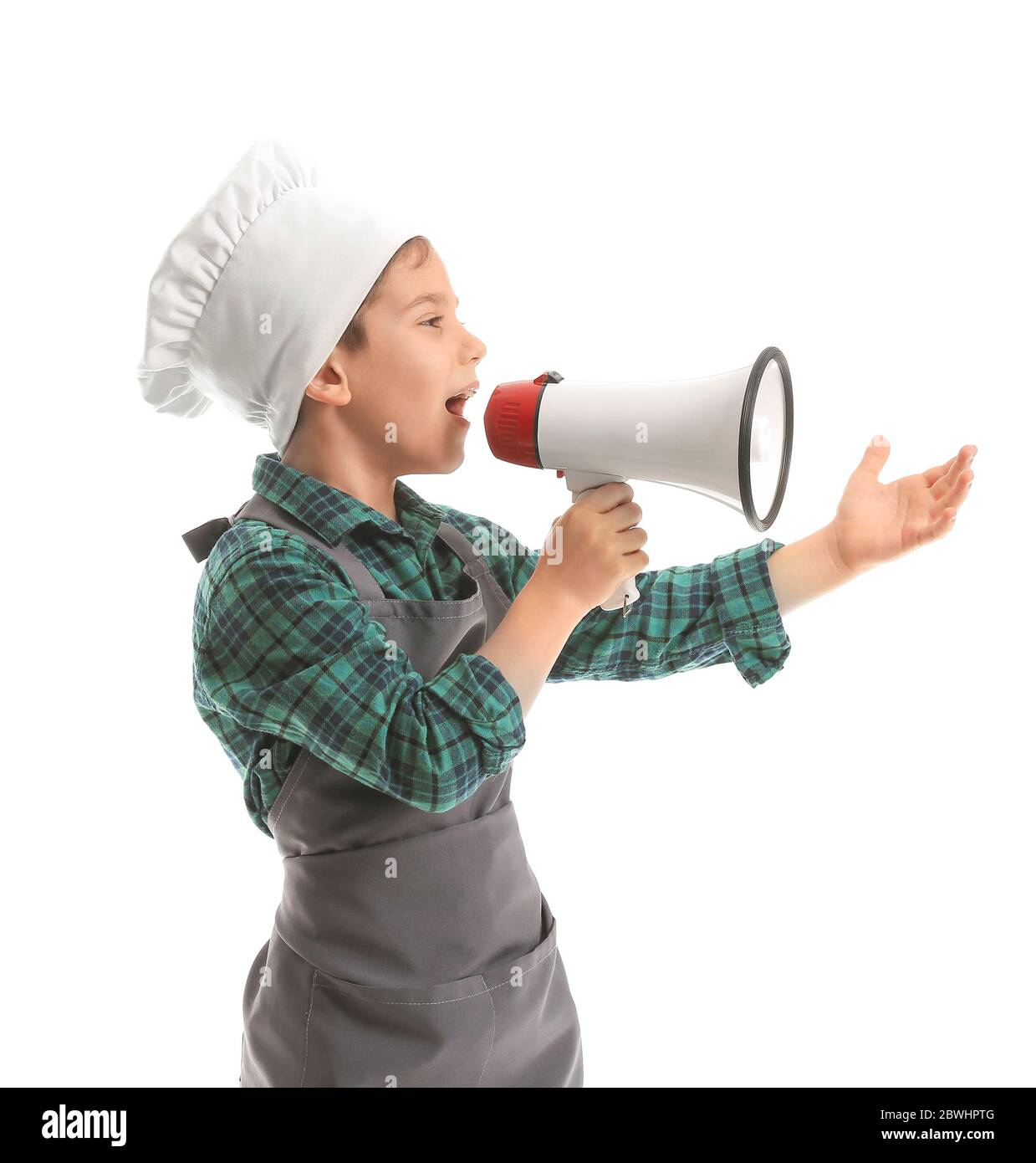 Portrait of little chef with megaphone on white background Stock Photo ...