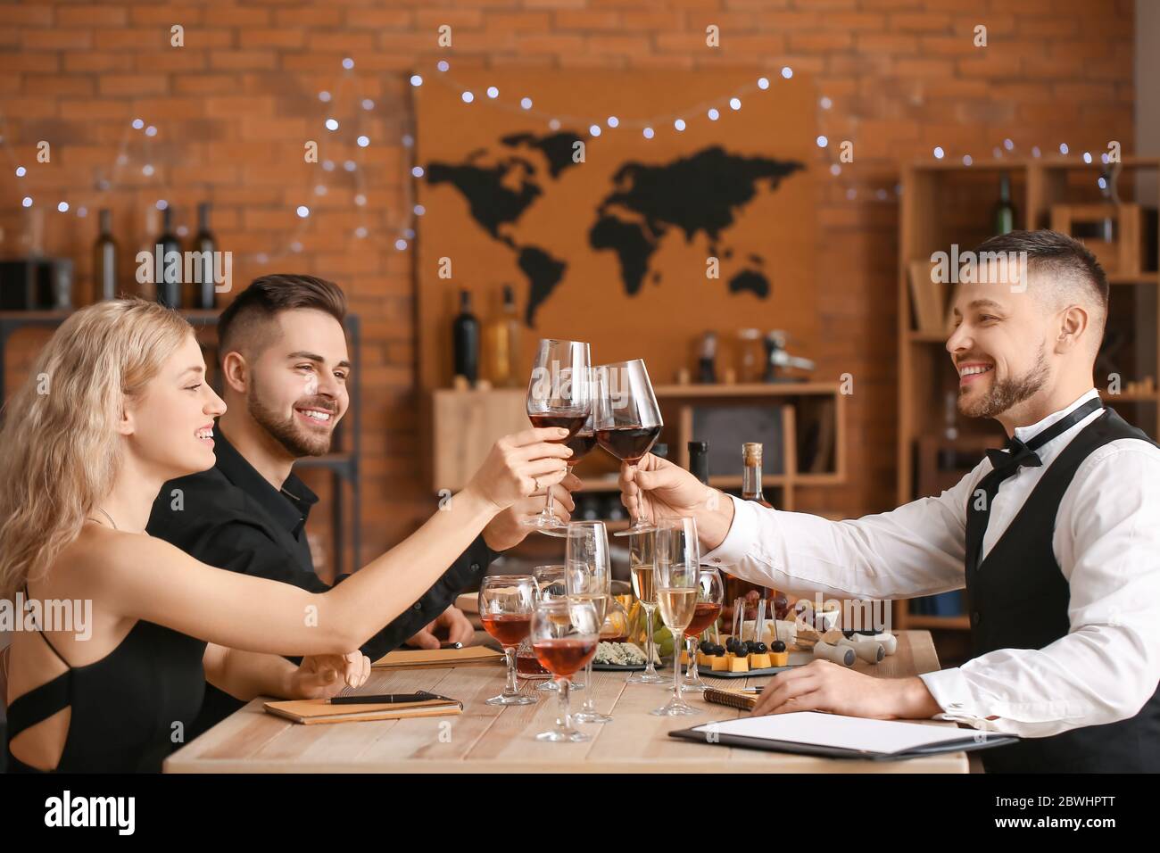 People tasting wine at the restaurant Stock Photo - Alamy