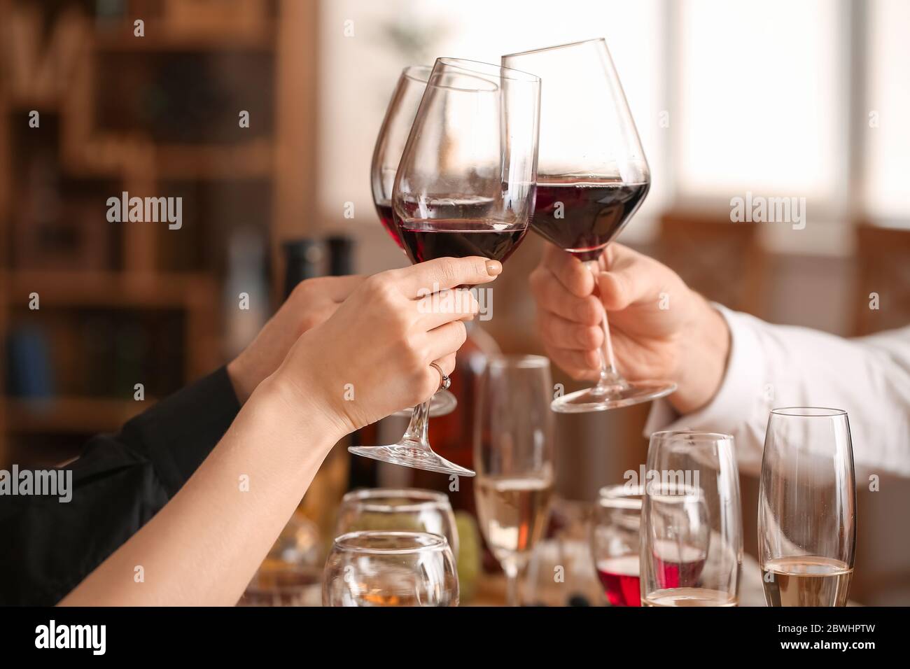 People tasting wine at the restaurant Stock Photo - Alamy