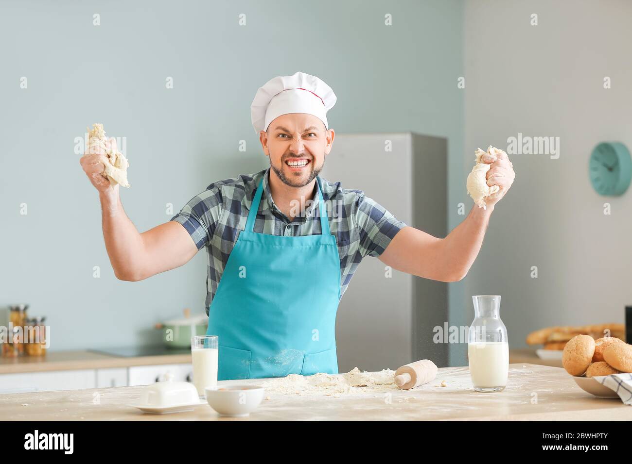 Handsome chef cooking hi-res stock photography and images - Alamy