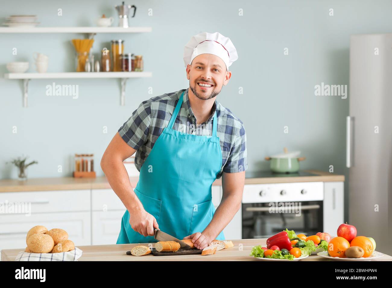 Male chef fruits vegetables in hi-res stock photography and images - Alamy