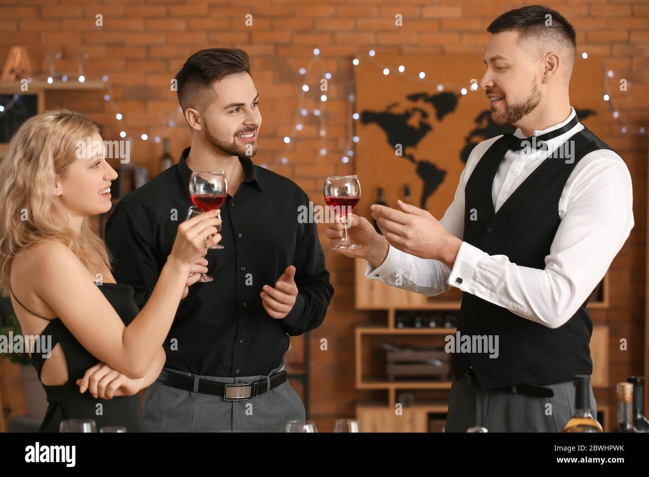 People tasting wine at the restaurant Stock Photo - Alamy