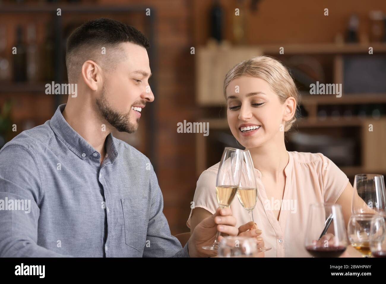 People tasting wine at the restaurant Stock Photo - Alamy