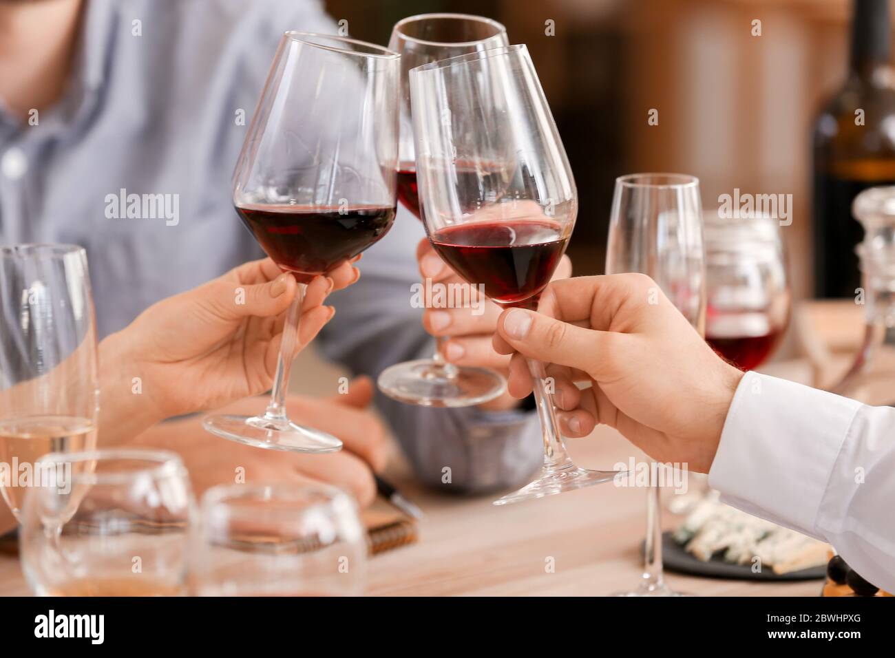 People tasting wine at the restaurant Stock Photo - Alamy
