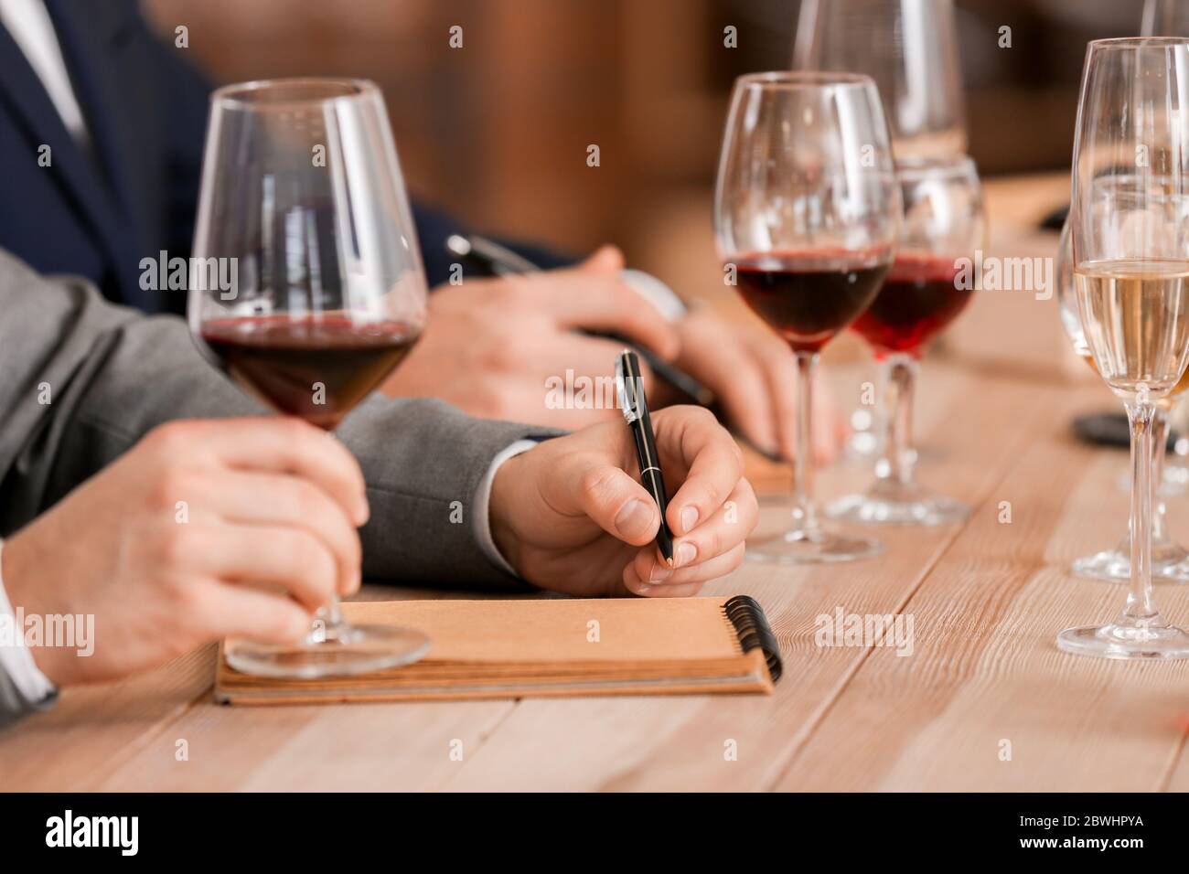 People tasting wine at the restaurant, closeup Stock Photo - Alamy