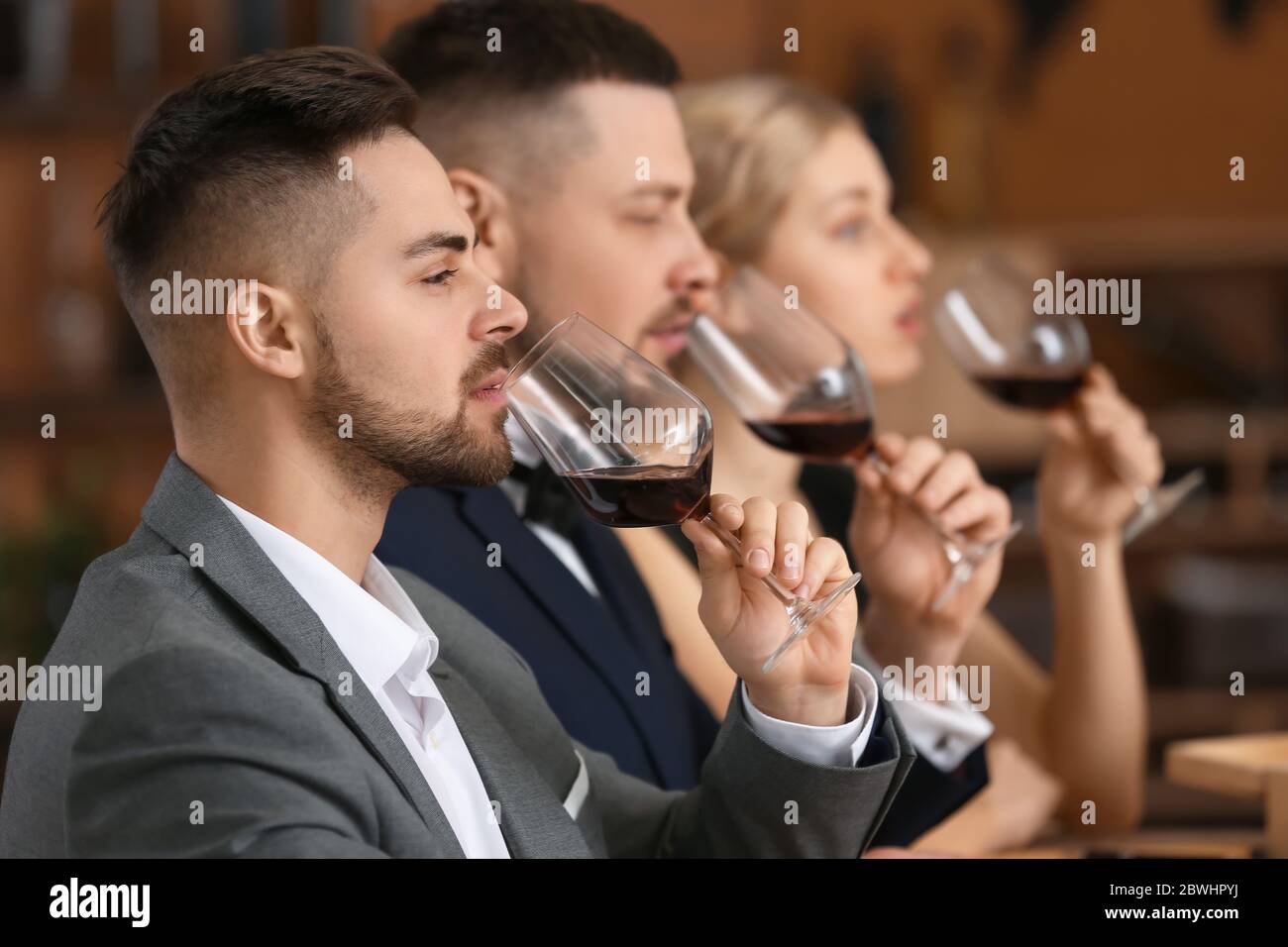 People tasting wine at the restaurant Stock Photo - Alamy