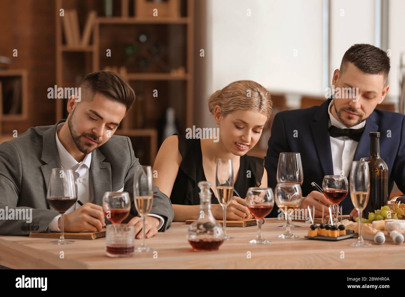 People tasting wine at the restaurant Stock Photo - Alamy