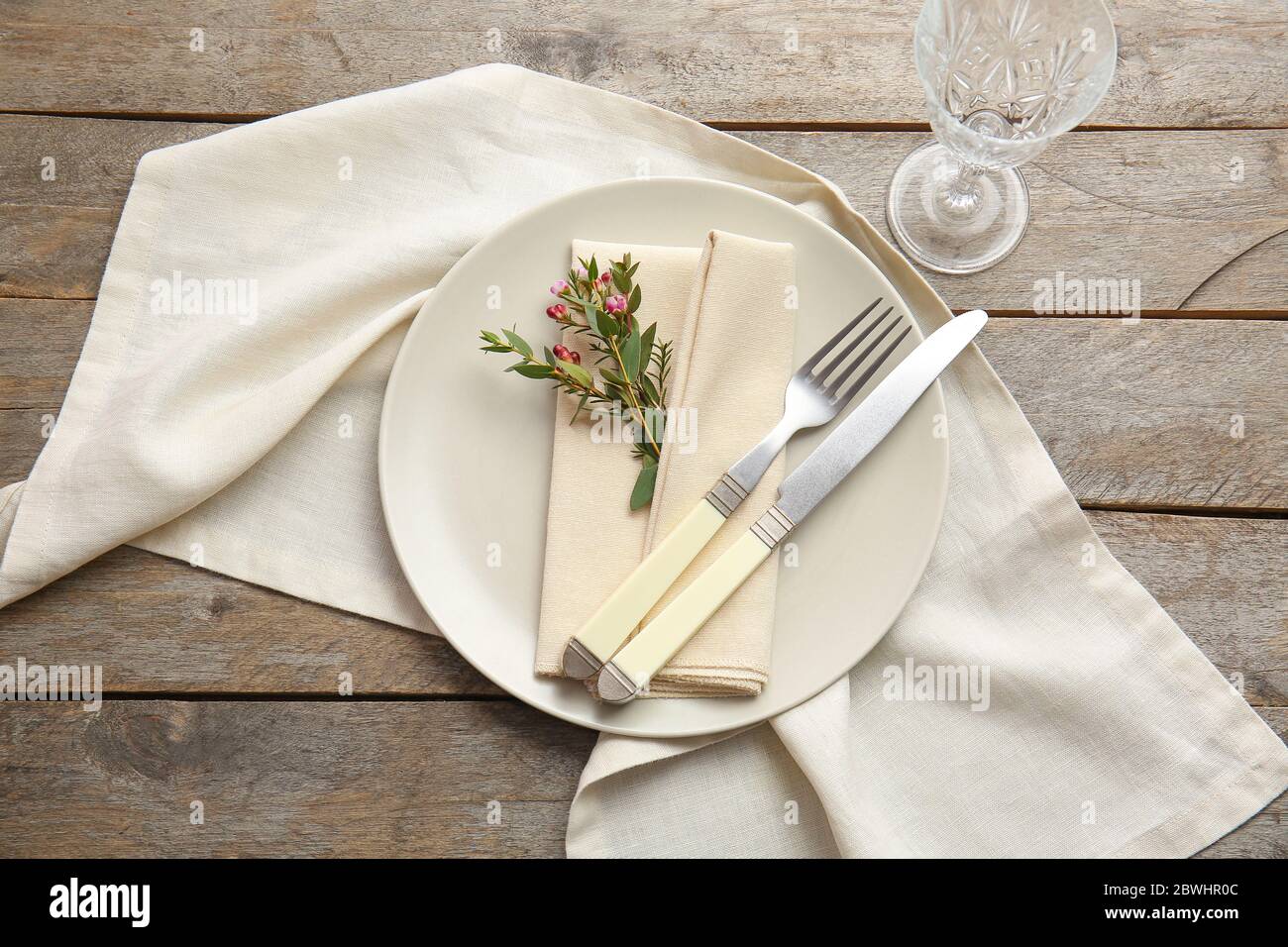 Beautiful table setting on wooden background Stock Photo - Alamy