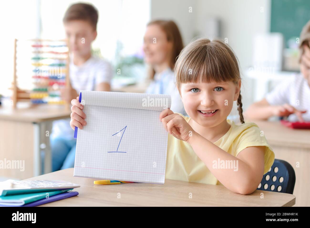 Boy doing maths hi-res stock photography and images - Alamy