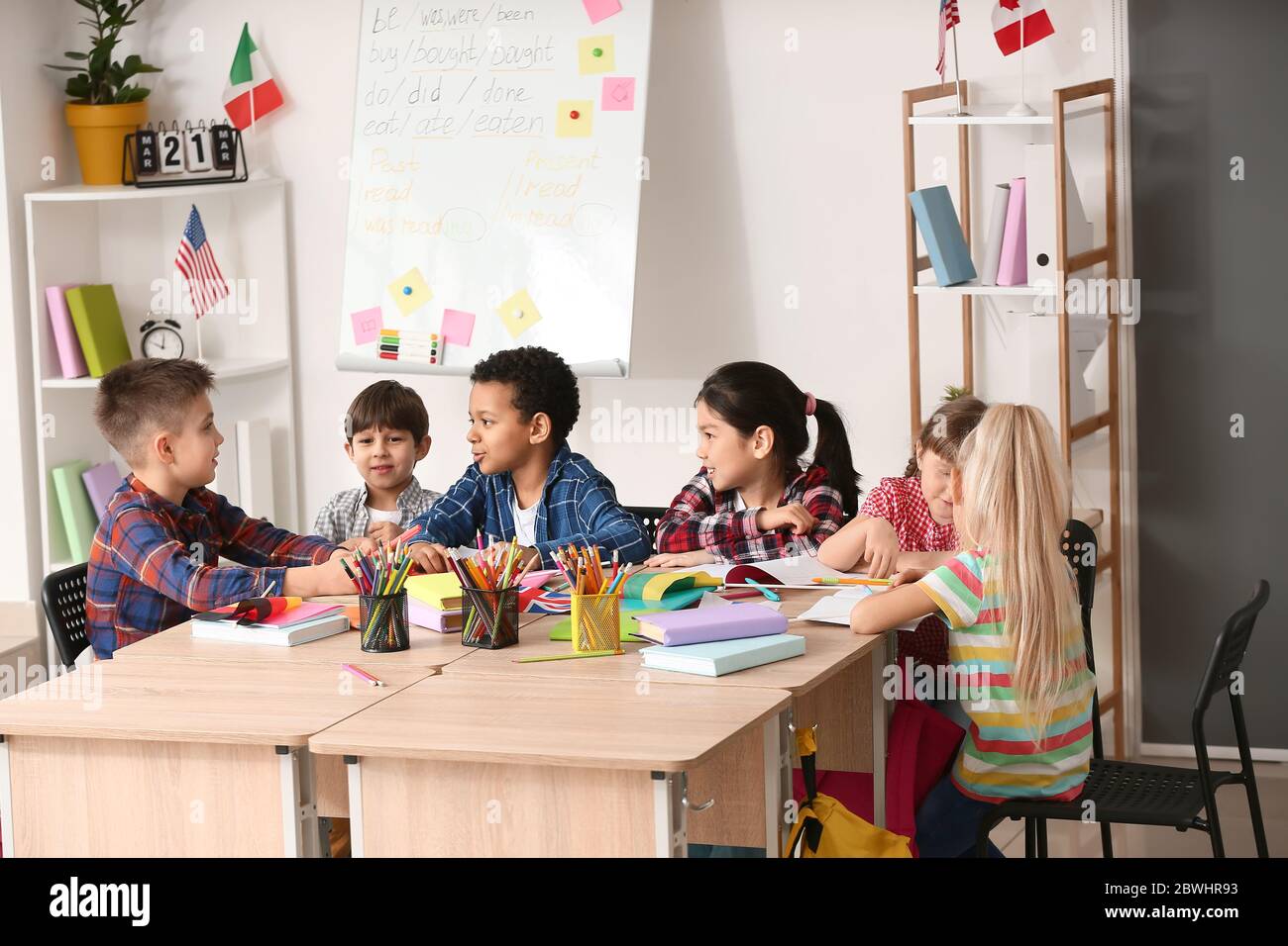 Little children during lesson at language school Stock Photo - Alamy