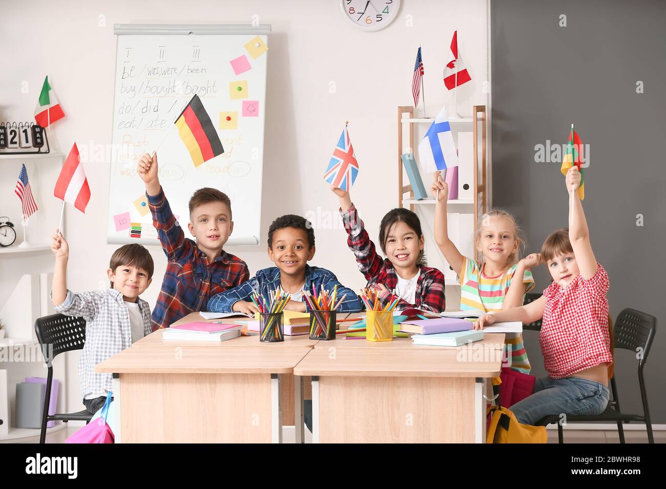 Little children during lesson at language school Stock Photo - Alamy