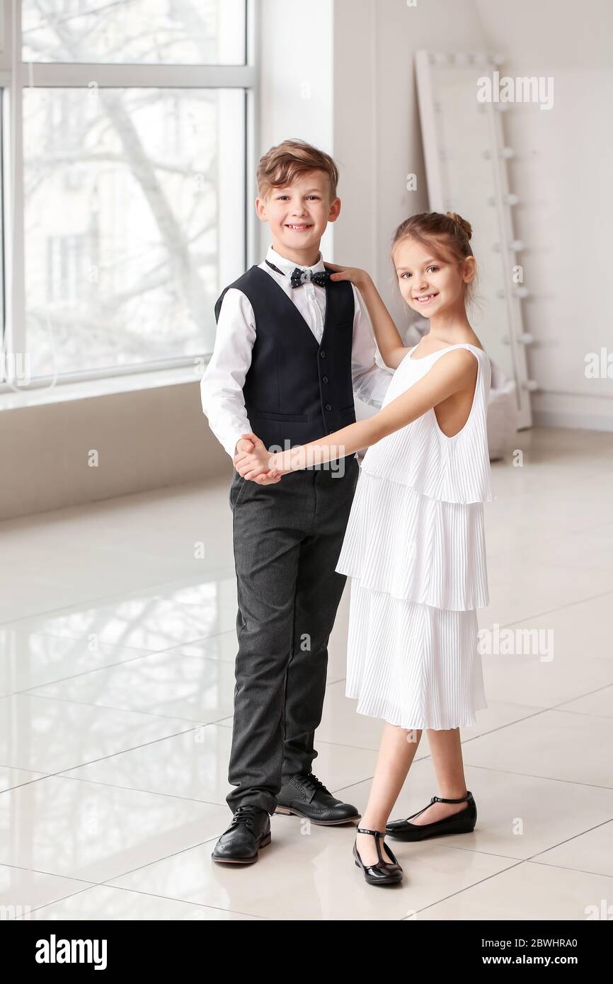 Cute little children dancing in studio Stock Photo - Alamy