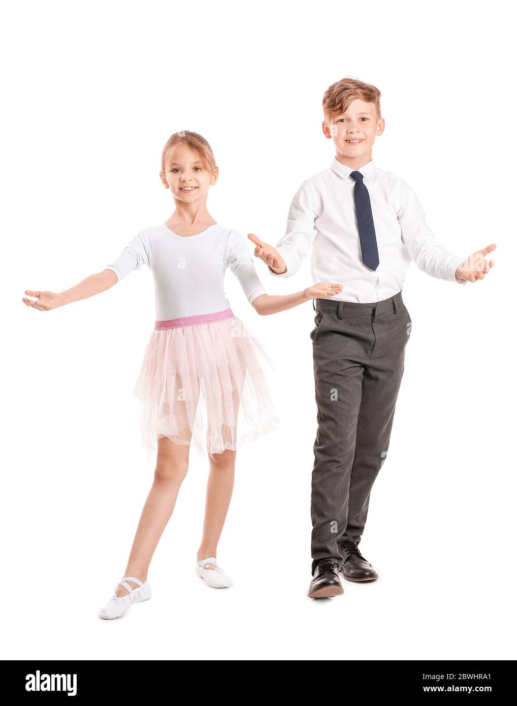 Cute little children dancing against white background Stock Photo - Alamy