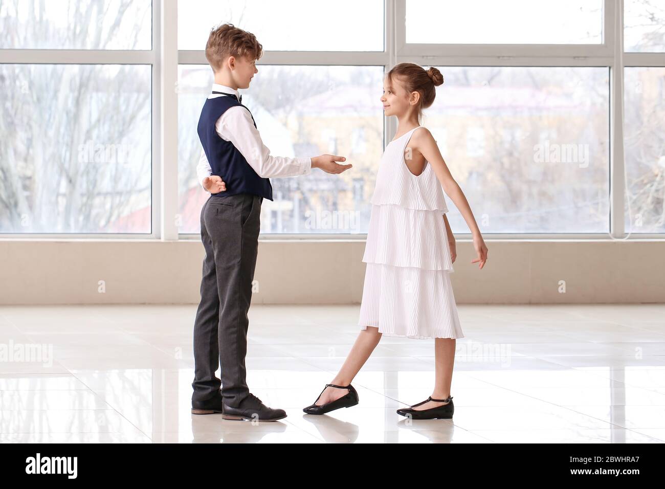Cute little children dancing in studio Stock Photo - Alamy