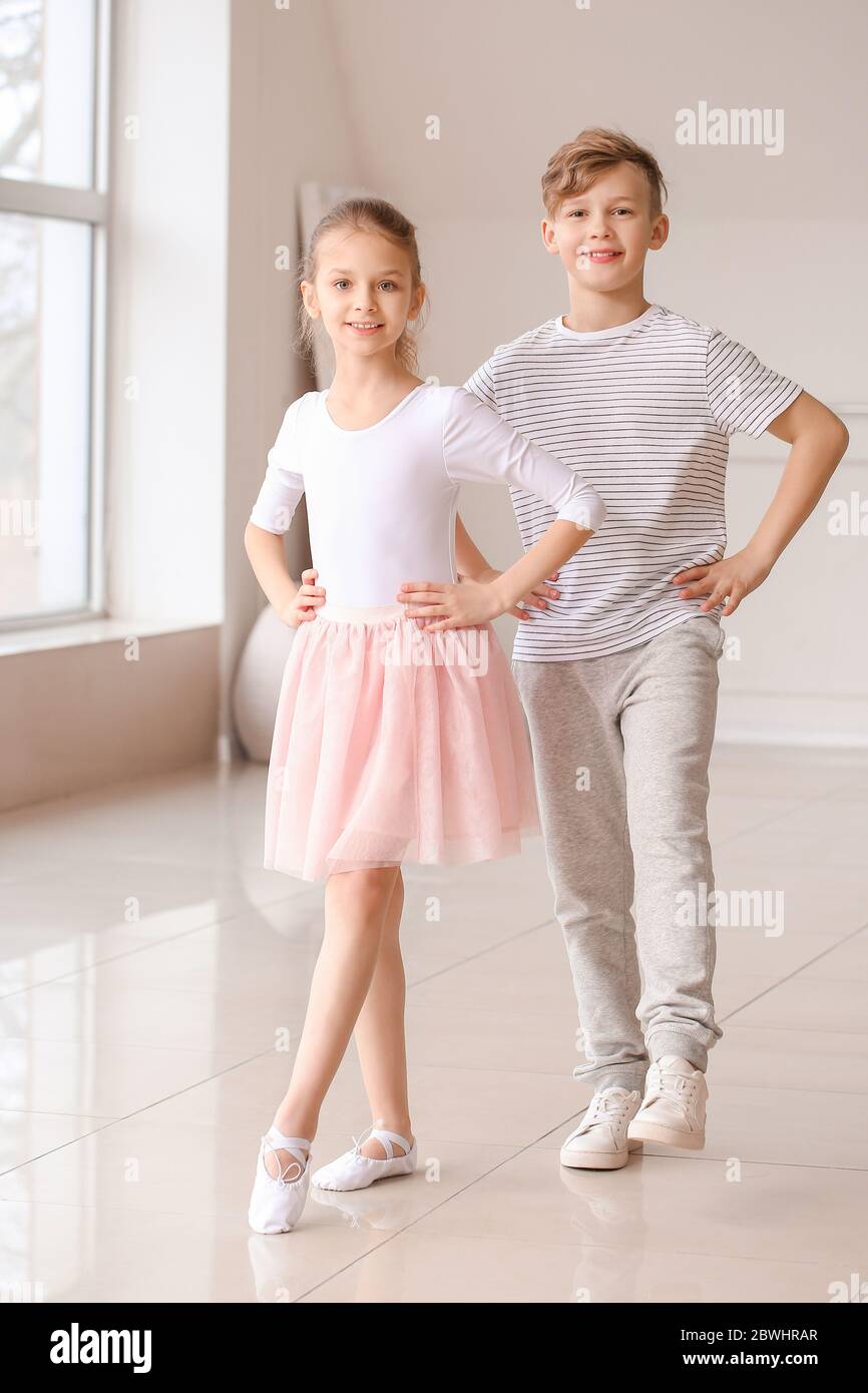 Cute little children dancing in studio Stock Photo - Alamy