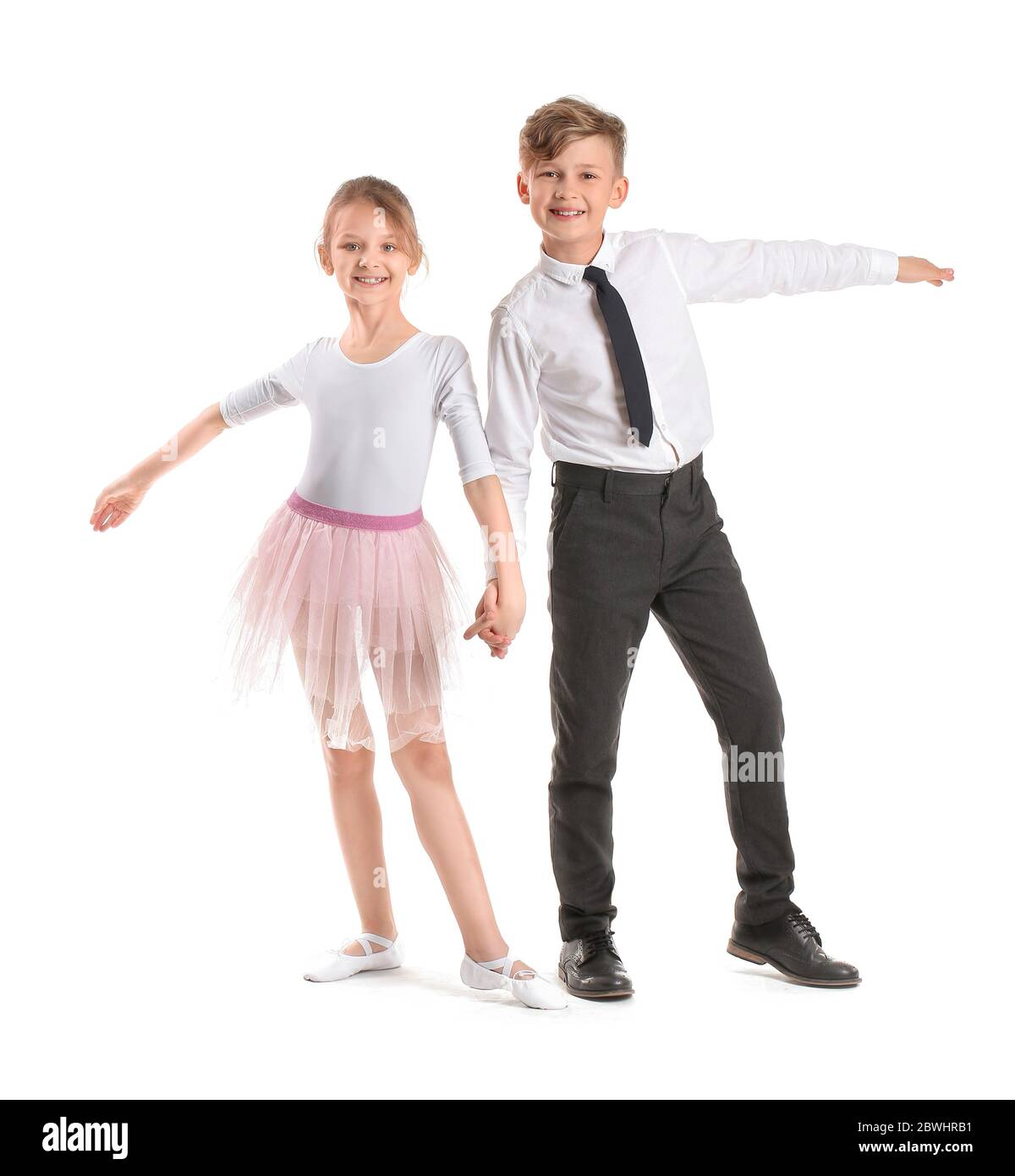 Cute little children dancing against white background Stock Photo - Alamy