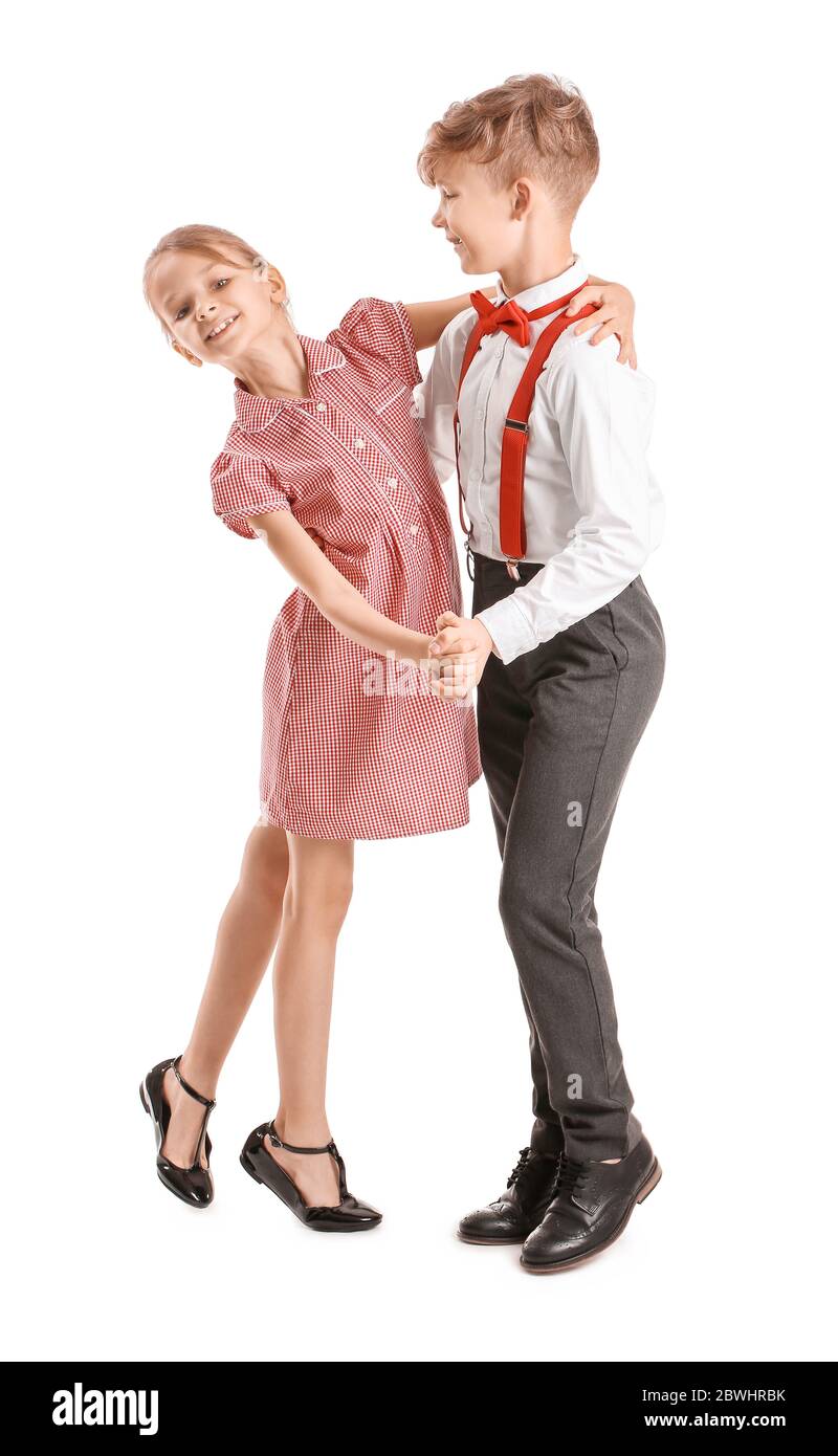 Cute little children dancing against white background Stock Photo - Alamy
