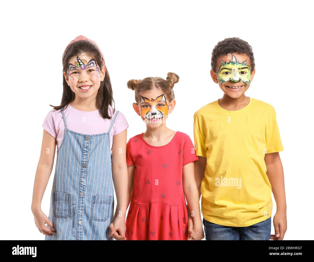 Funny children with face painting on white background Stock Photo - Alamy