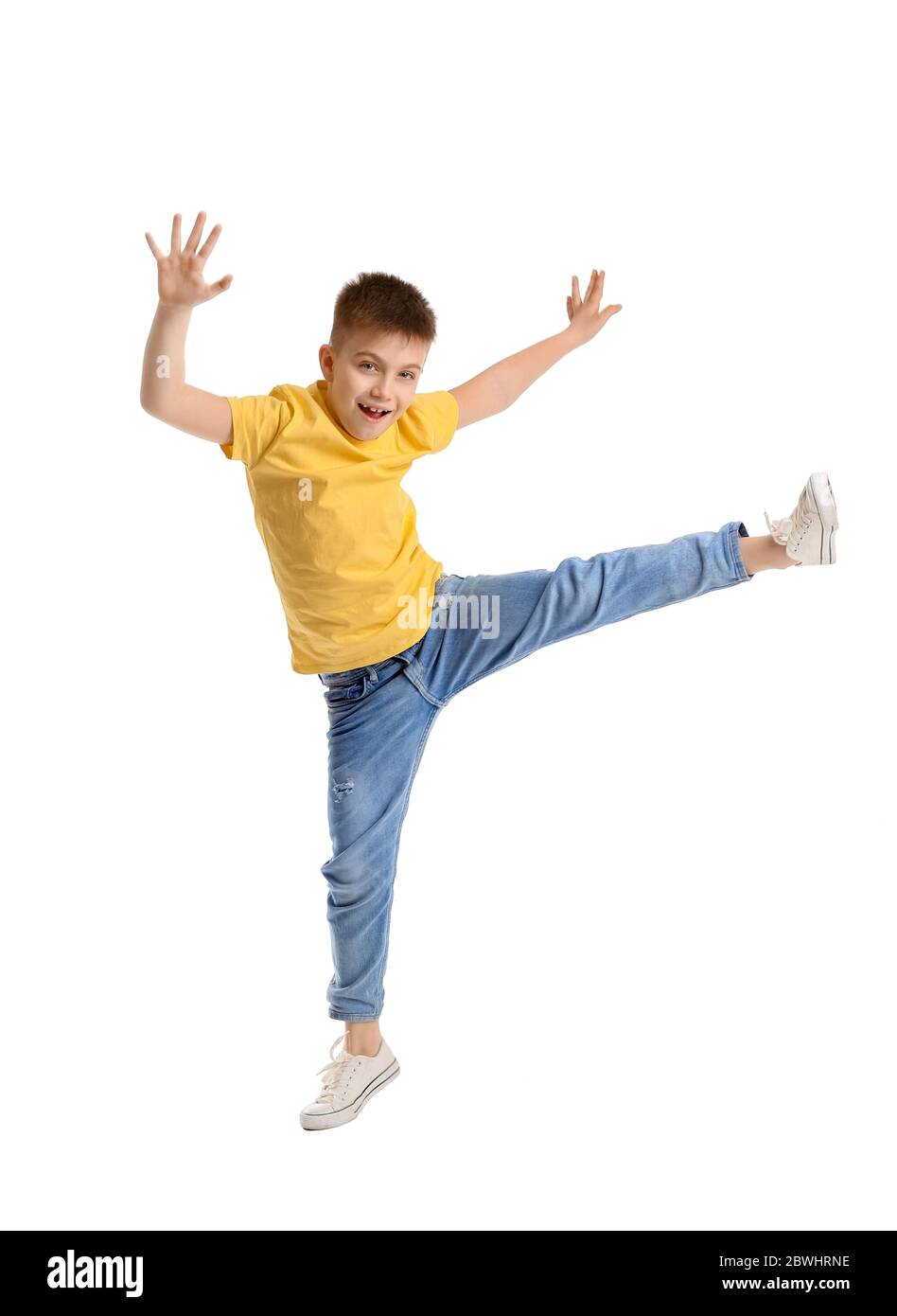Cute dancing boy on white background Stock Photo - Alamy