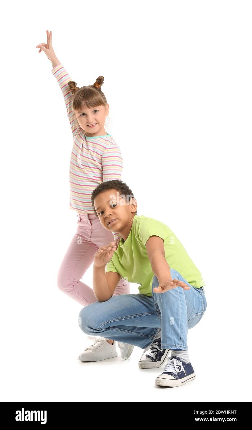 Cute dancing children on white background Stock Photo - Alamy