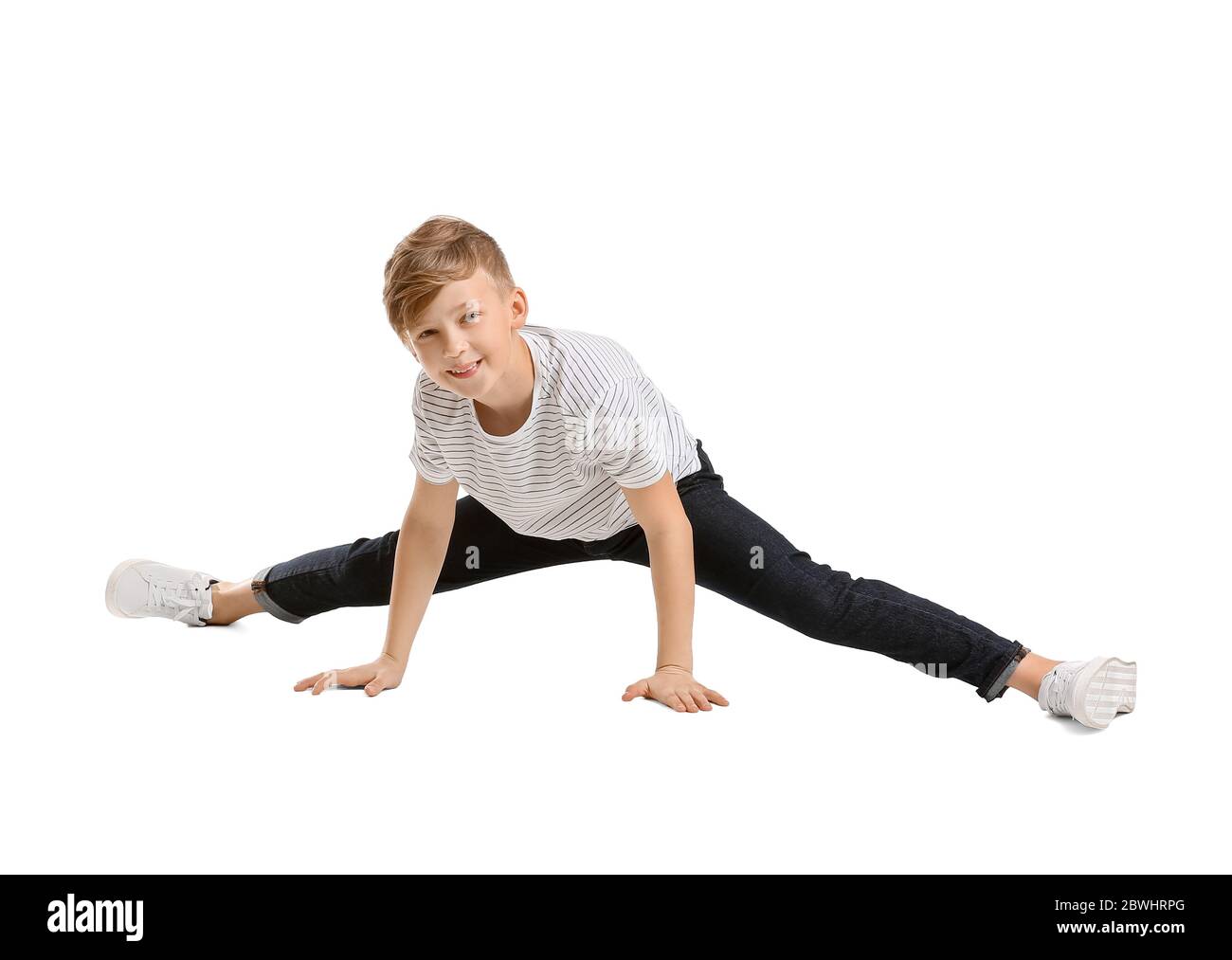 Cute dancing boy on white background Stock Photo - Alamy