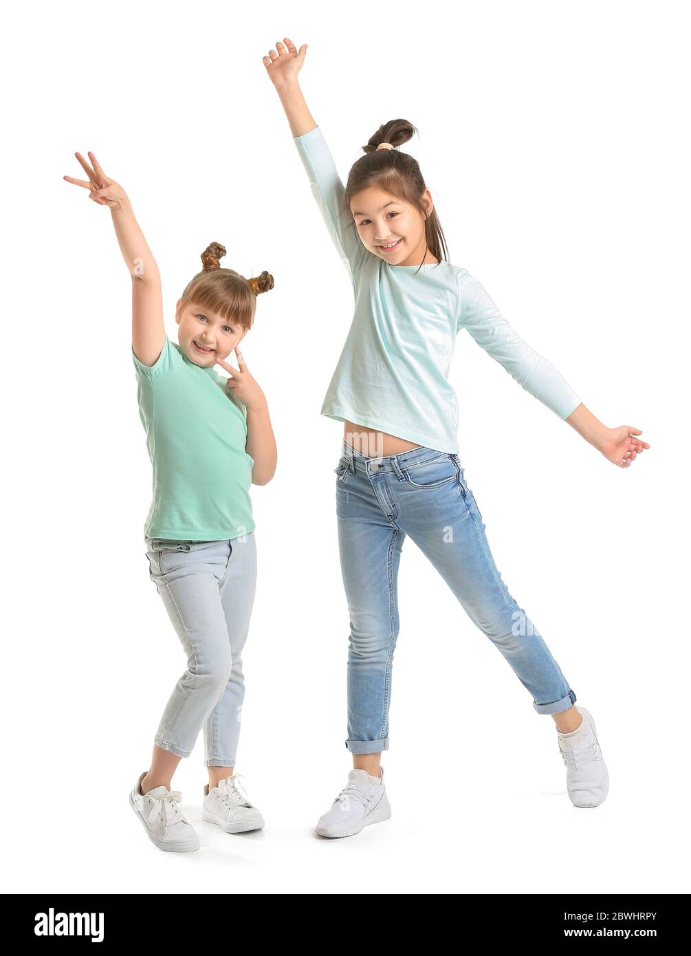 Cute dancing children on white background Stock Photo - Alamy