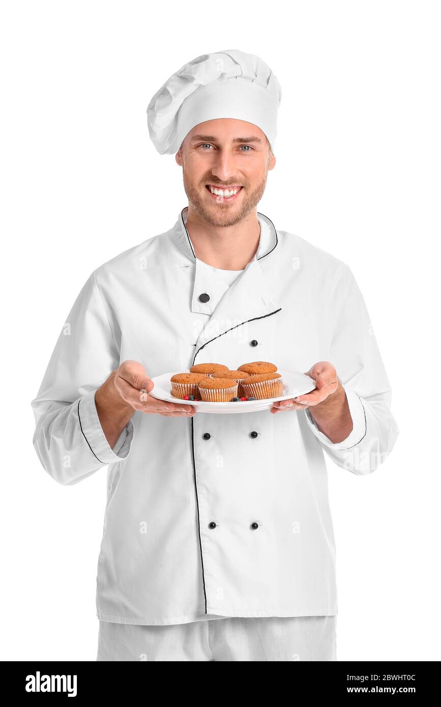 Male confectioner with tasty dessert on white background Stock Photo ...