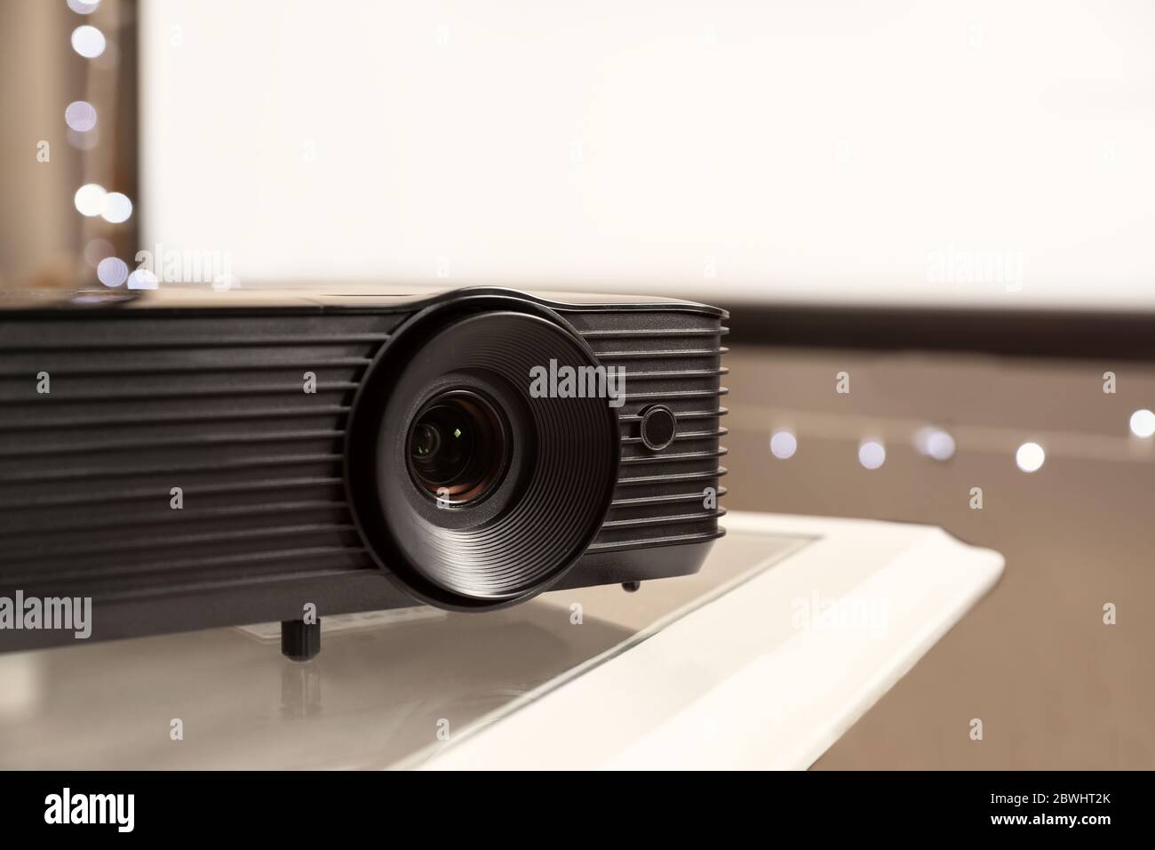 Modern video projector in room Stock Photo - Alamy
