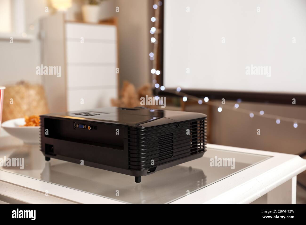 Modern video projector in room Stock Photo - Alamy