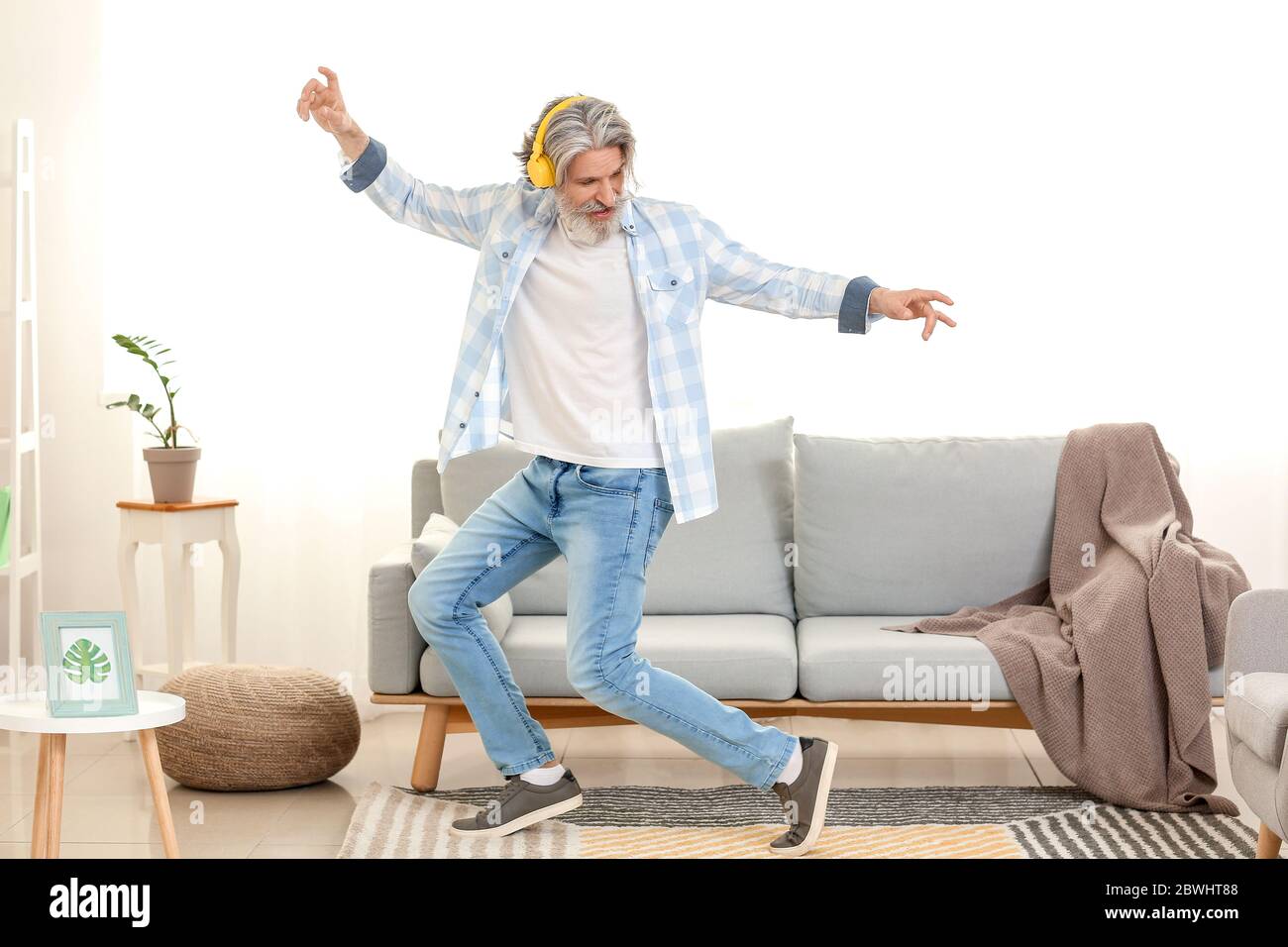 Cool senior man dancing at home Stock Photo - Alamy
