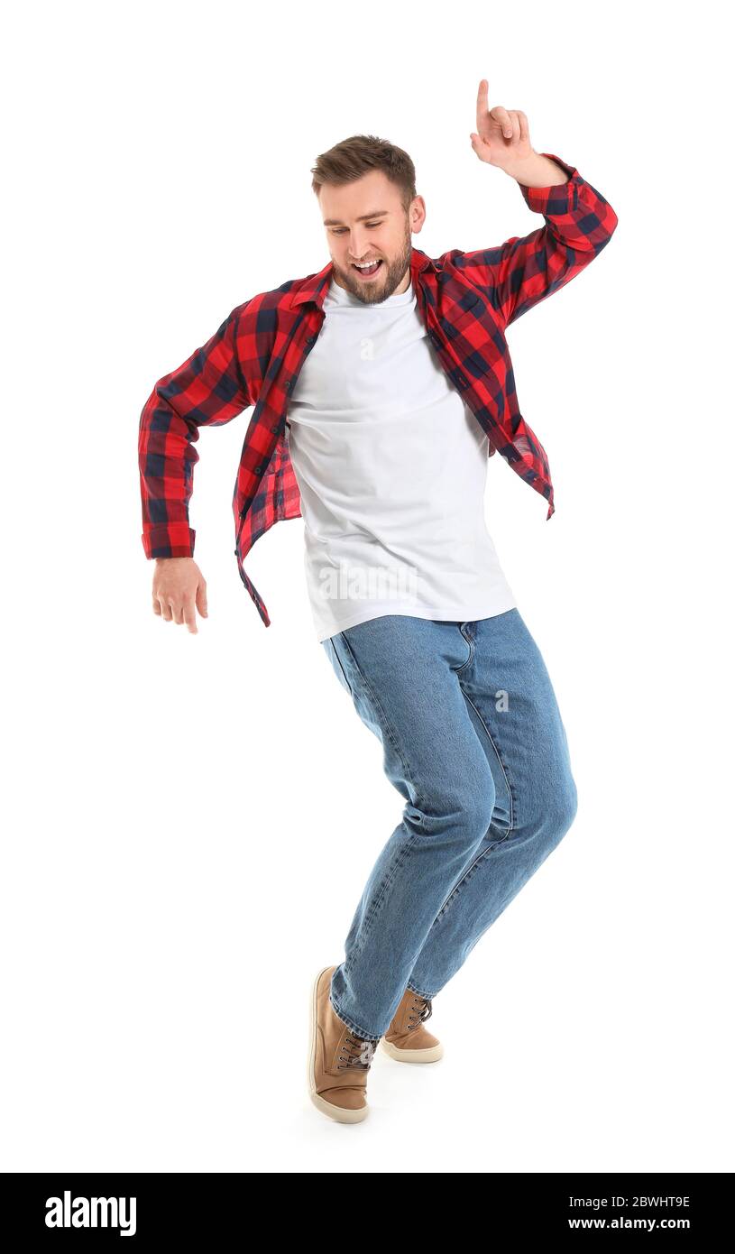 Handsome young man dancing against white background Stock Photo - Alamy