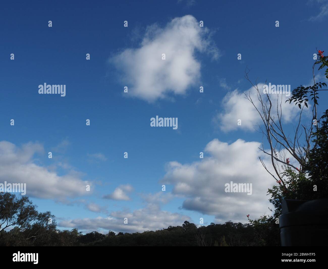 sunny day outside with some cloud Stock Photo - Alamy