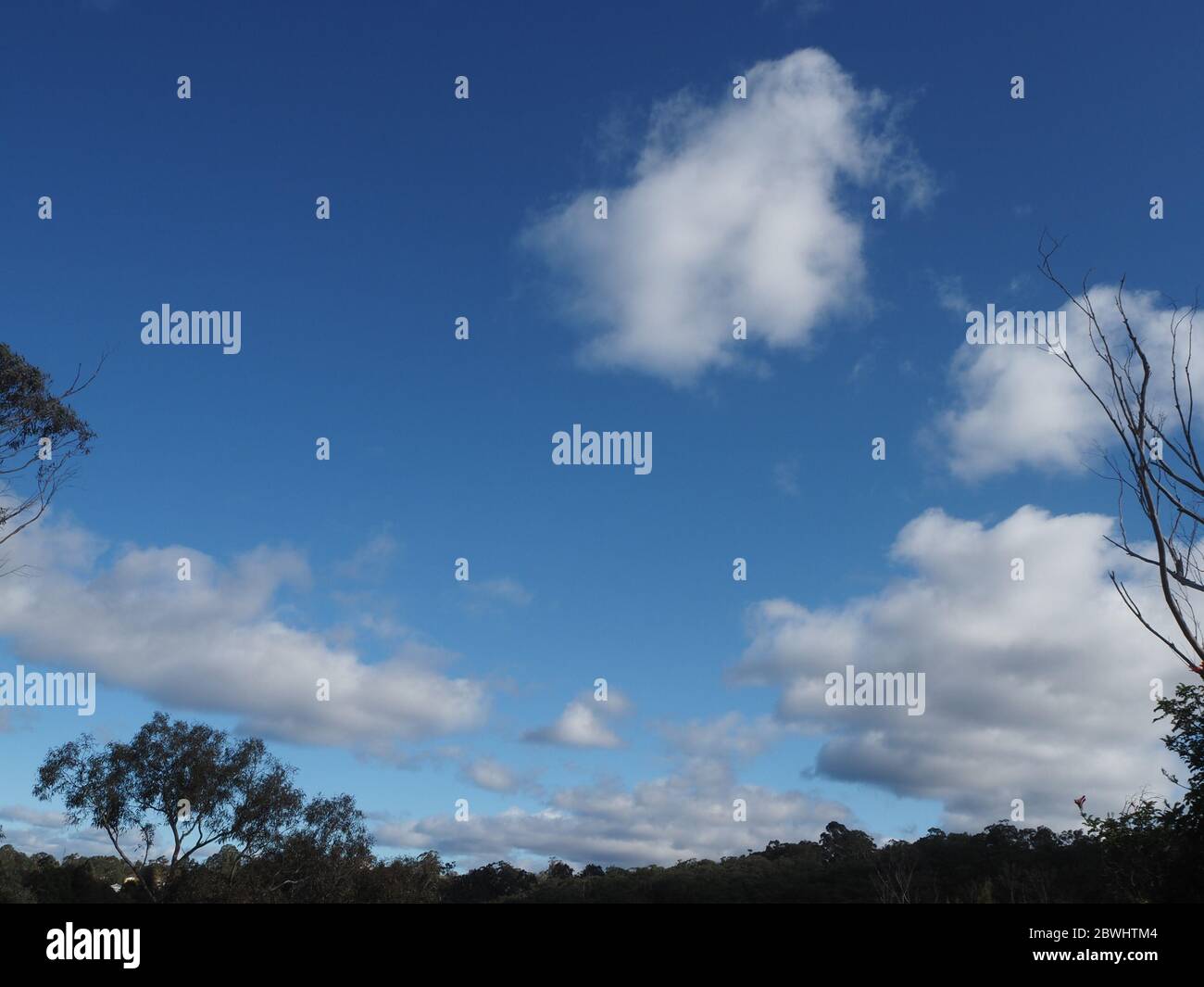 sunny day outside with some cloud Stock Photo - Alamy
