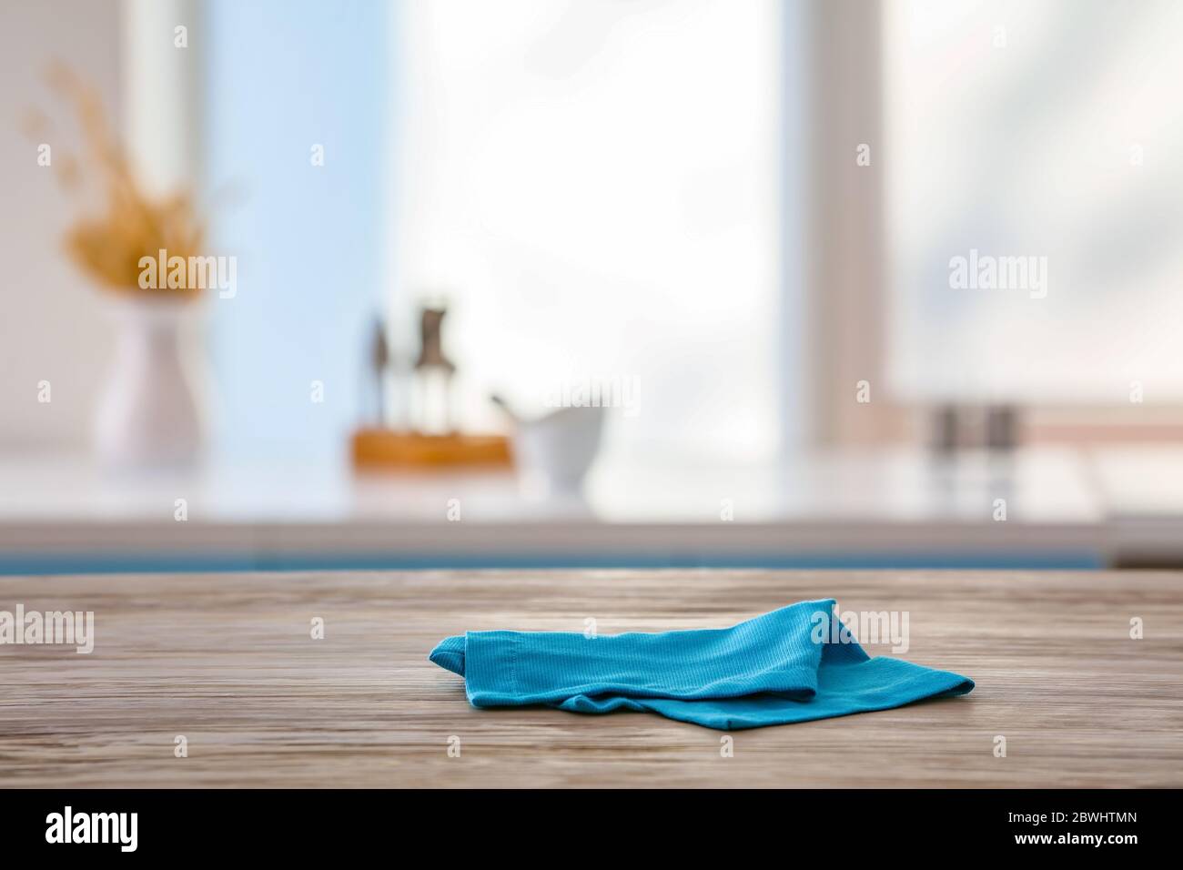Napkin on table in kitchen Stock Photo - Alamy