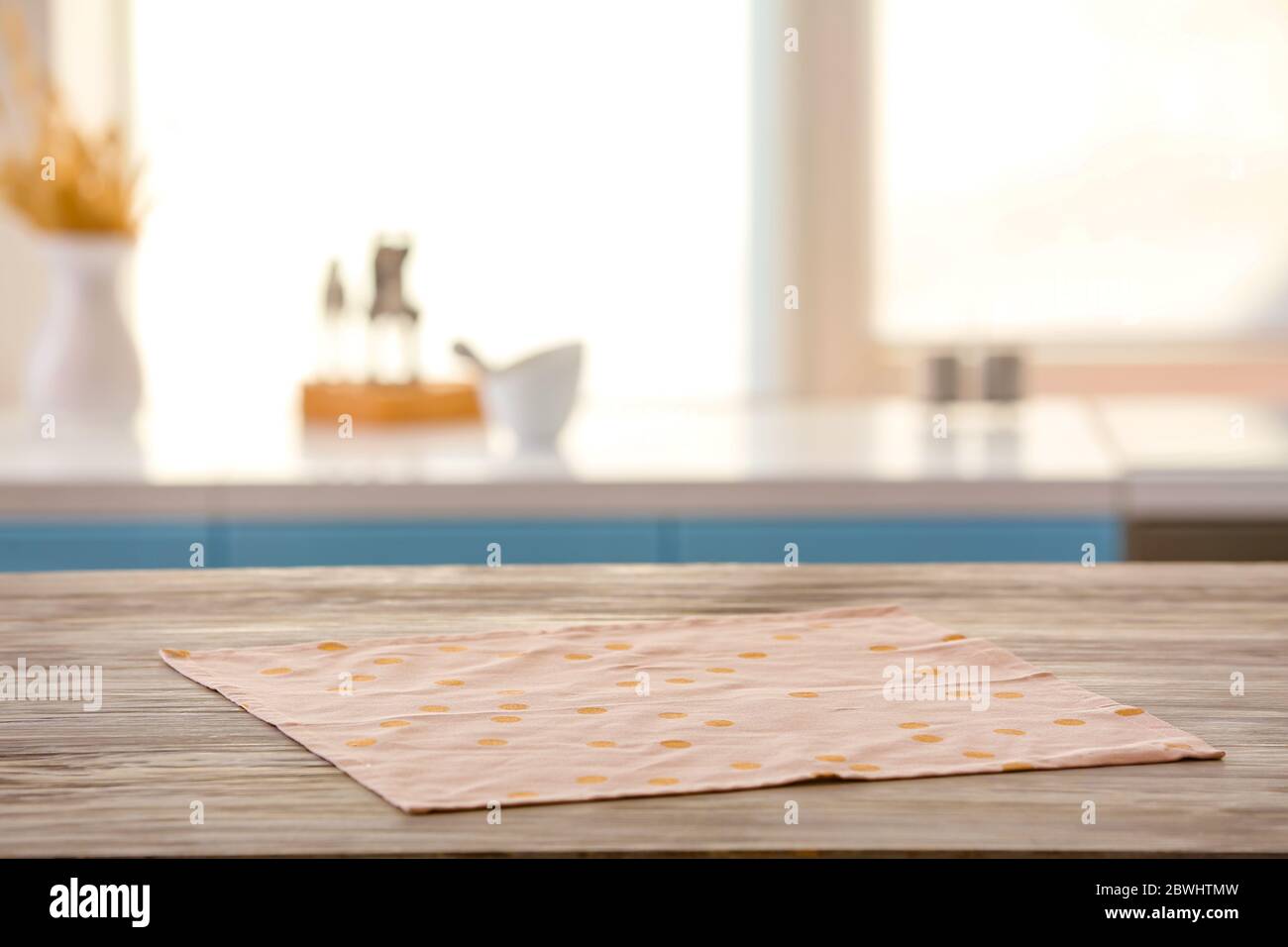 Napkin on table in kitchen Stock Photo - Alamy