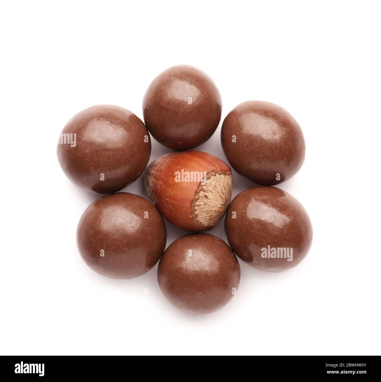 Tasty chocolate nuts on white background Stock Photo - Alamy