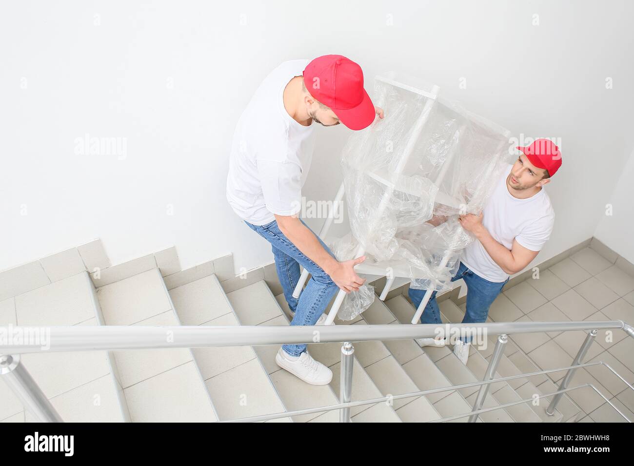 Carrying heavy furniture hi-res stock photography and images - Alamy
