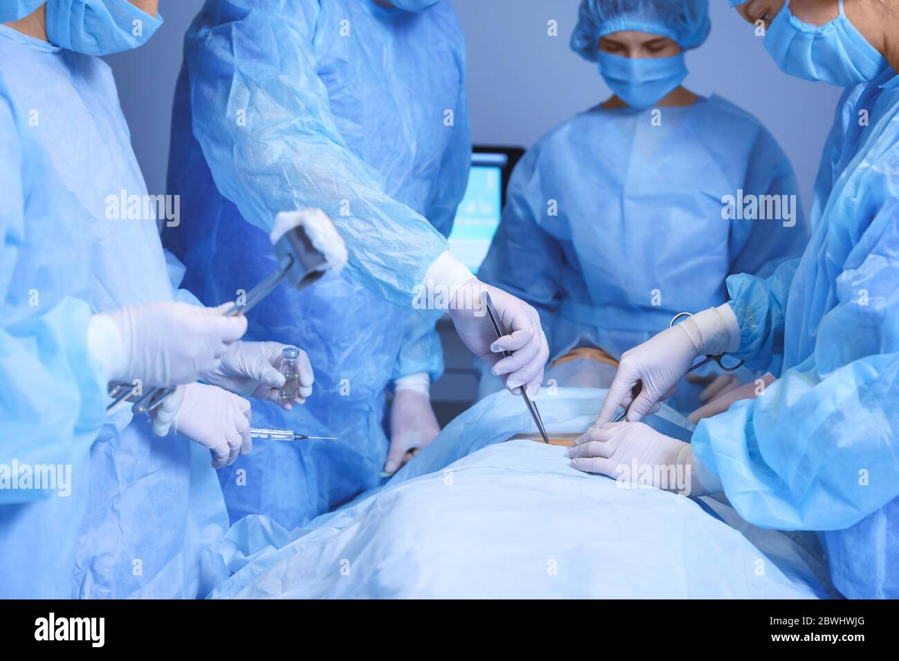 Operating of patient in modern hospital Stock Photo - Alamy