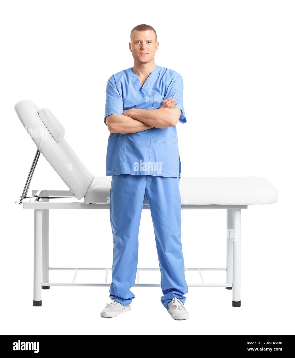 Portrait of massage therapist on white background Stock Photo - Alamy