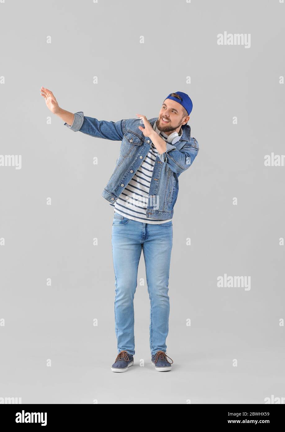Handsome young man dancing against hi-res stock photography and images ...