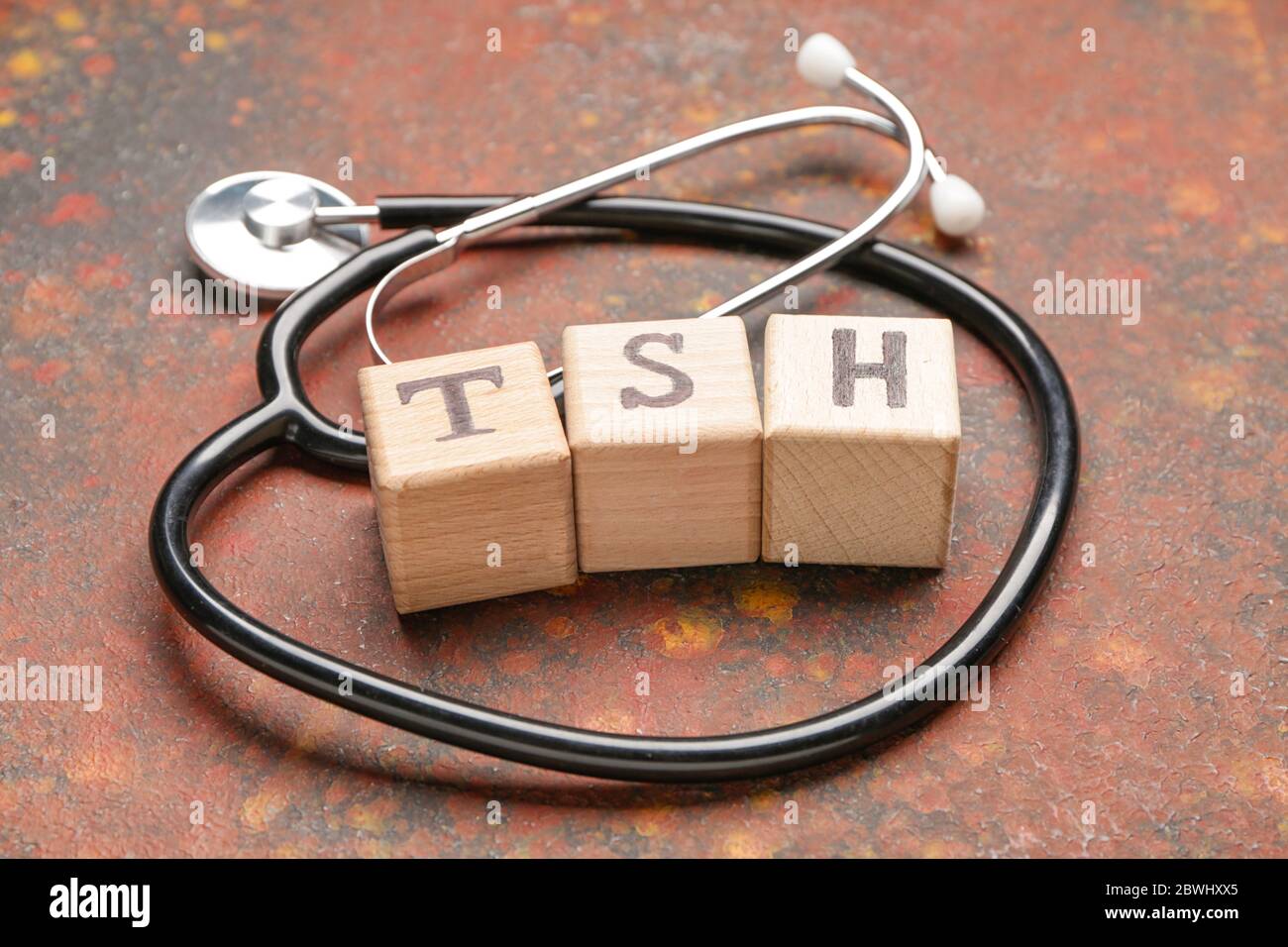 Cubes with abbreviation TSH and stethoscope on color background Stock ...