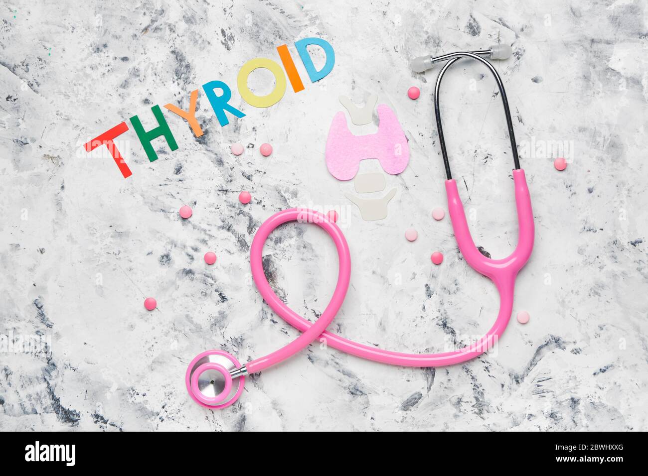 Text THYROID with pills and stethoscope on white background Stock Photo ...