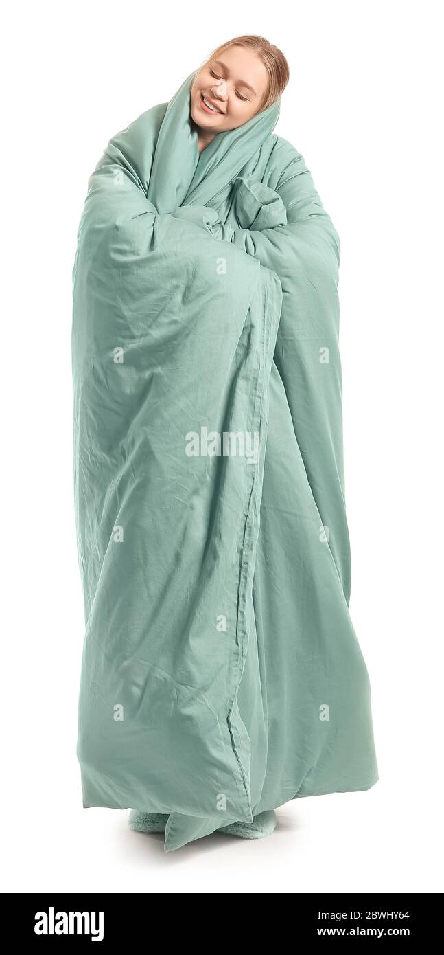 Young woman wrapped in blanket on white background Stock Photo - Alamy