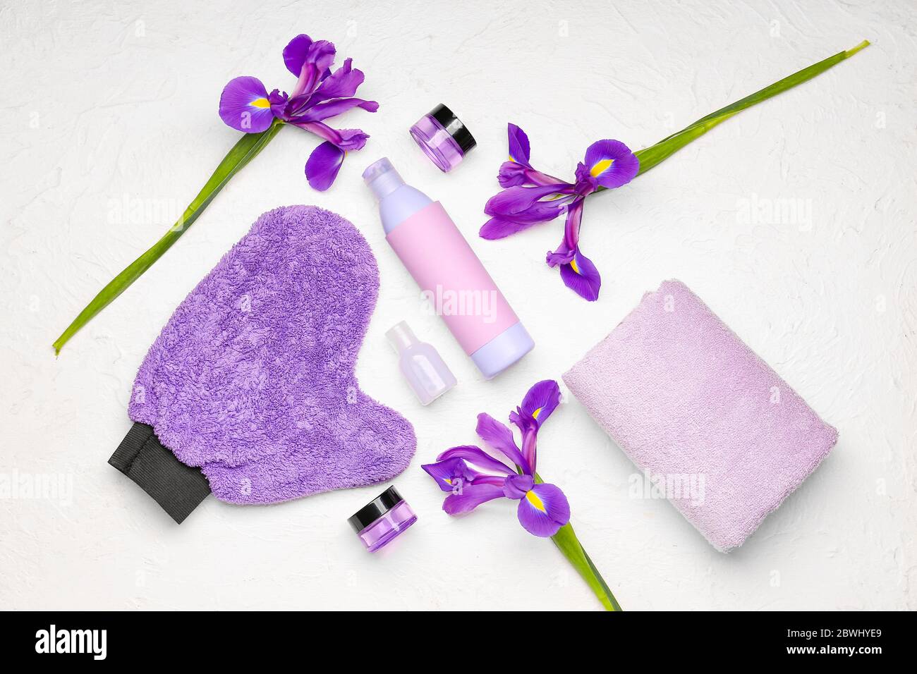 Shower gels with bath supplies on white background Stock Photo - Alamy