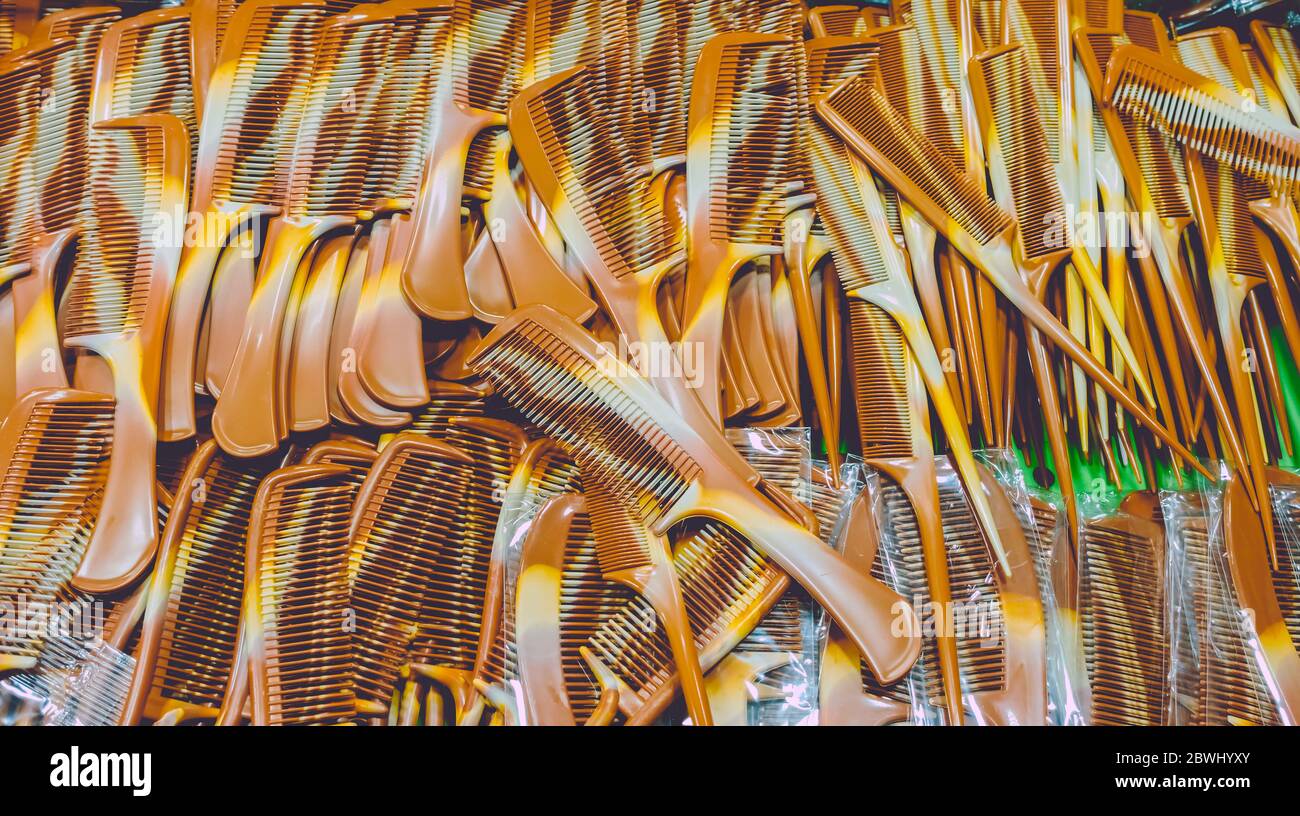 Top view of many brown plastic comb for sale at the local market Stock ...