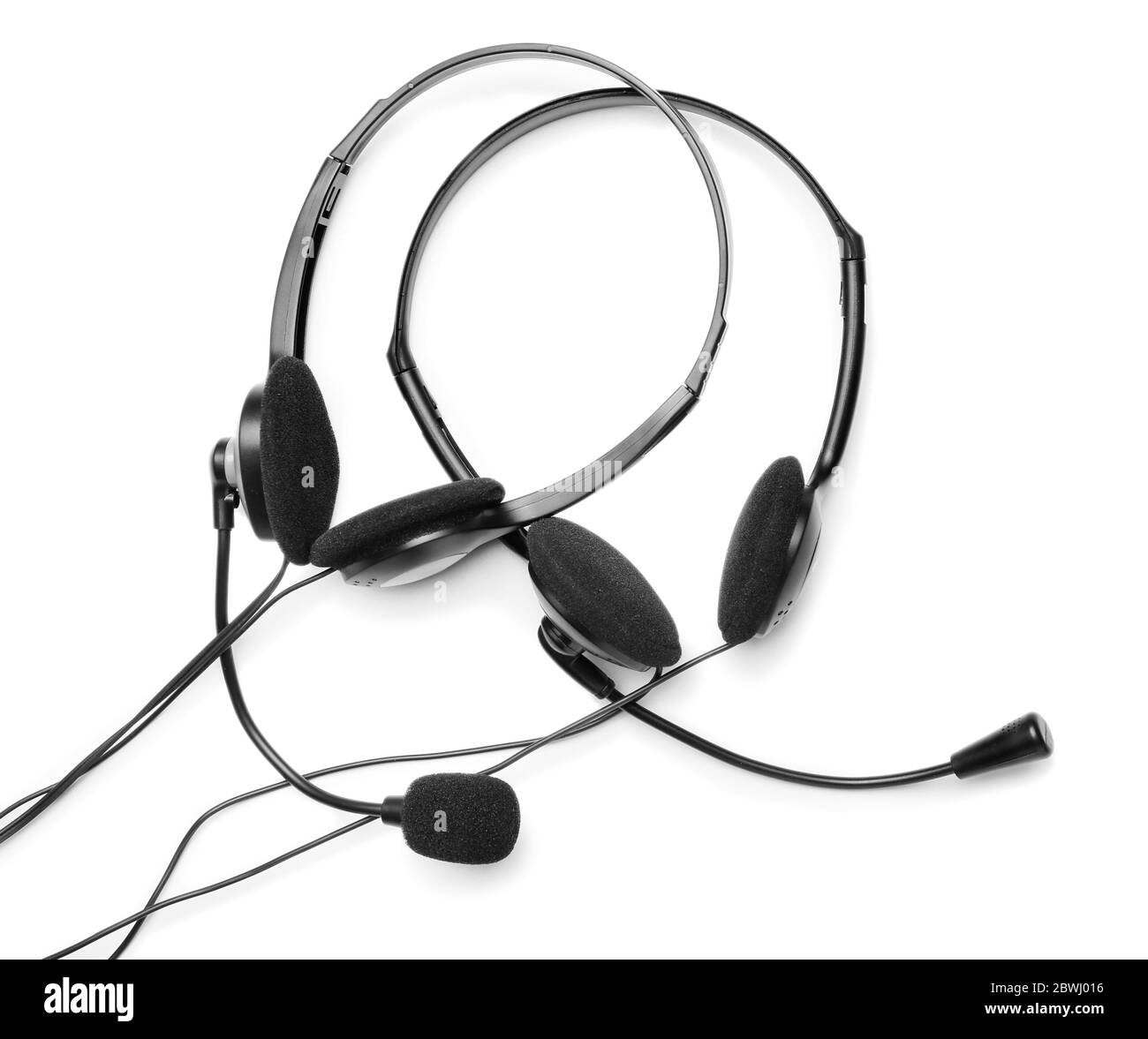 Modern headsets on white background Stock Photo - Alamy